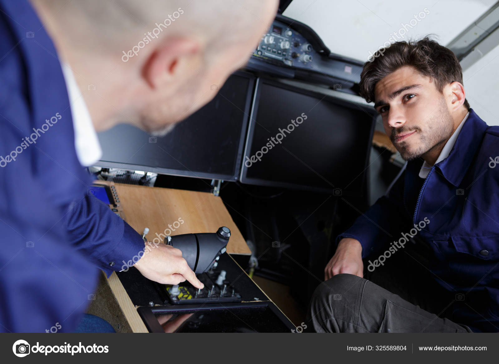 Two men talking in cockpit — Stock Photo © photography33 #325589804