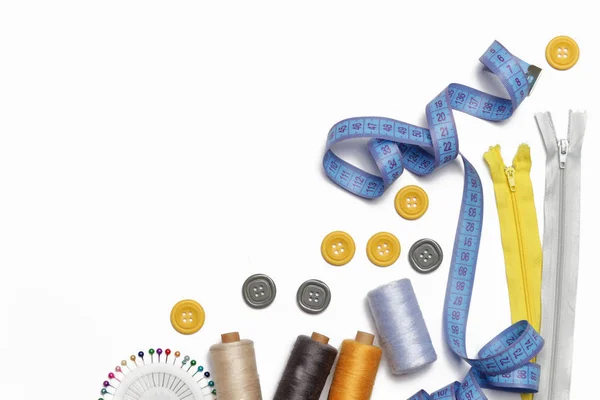 Set of sewing threads and accessories on color background Stock Photo ...