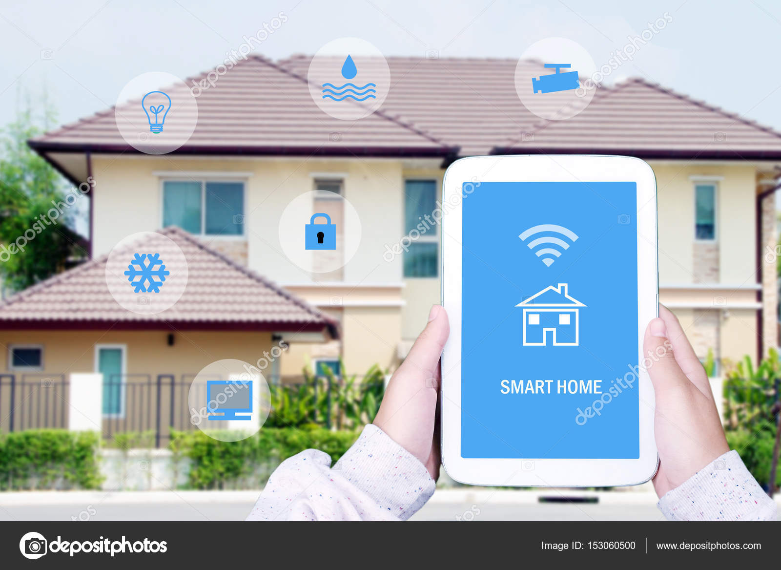 Hand using tablet with smart home control device on screen over Stock ...