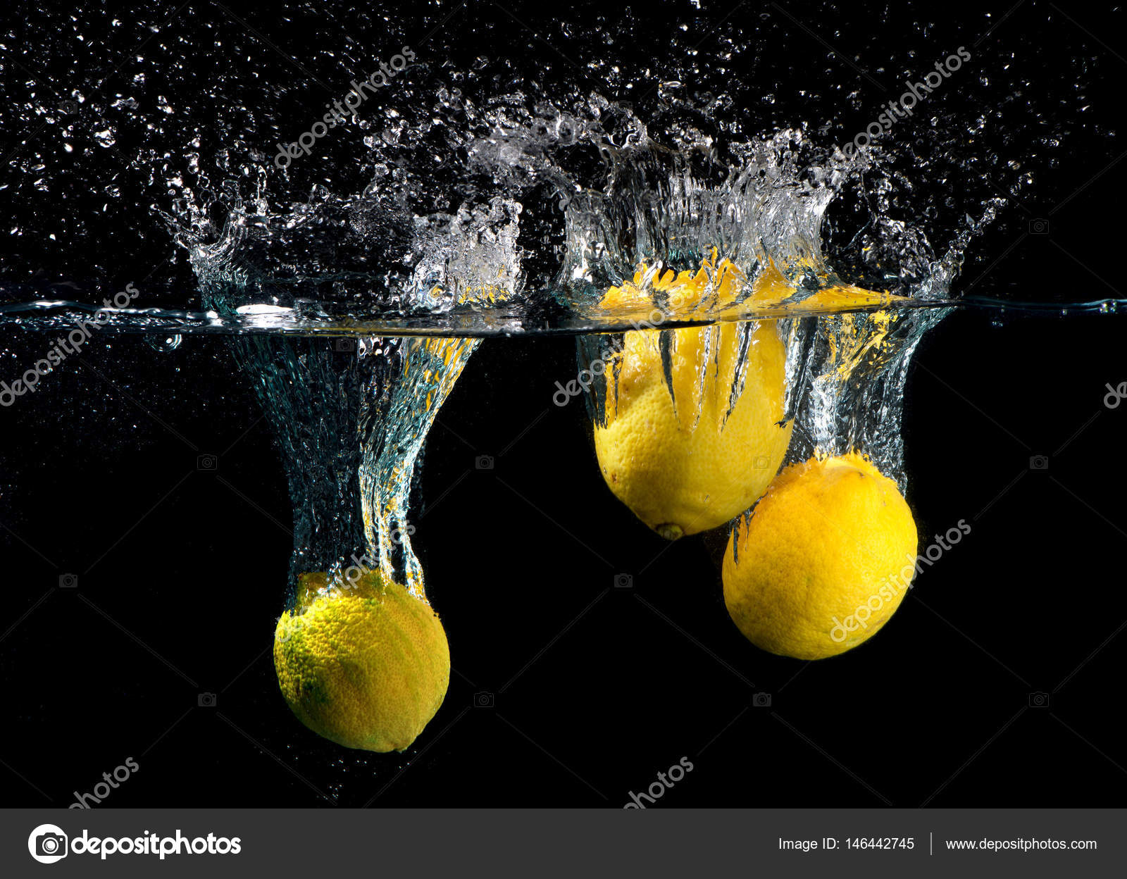 Lemon splash in water Stock Photo by ©alexraths 146442745