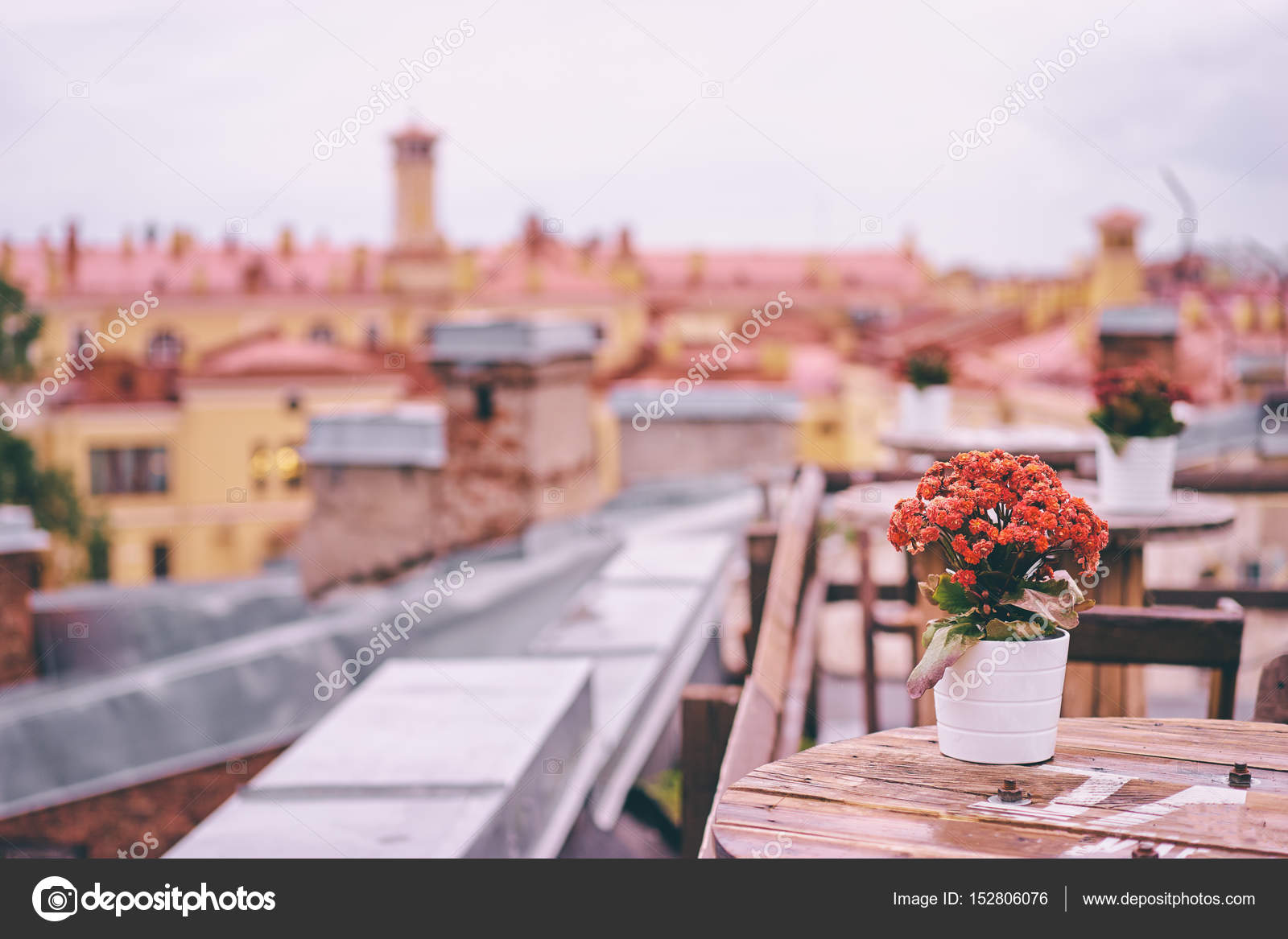 Cafe terrace on roof top Stock Photo by ©luengo_ua 152806076