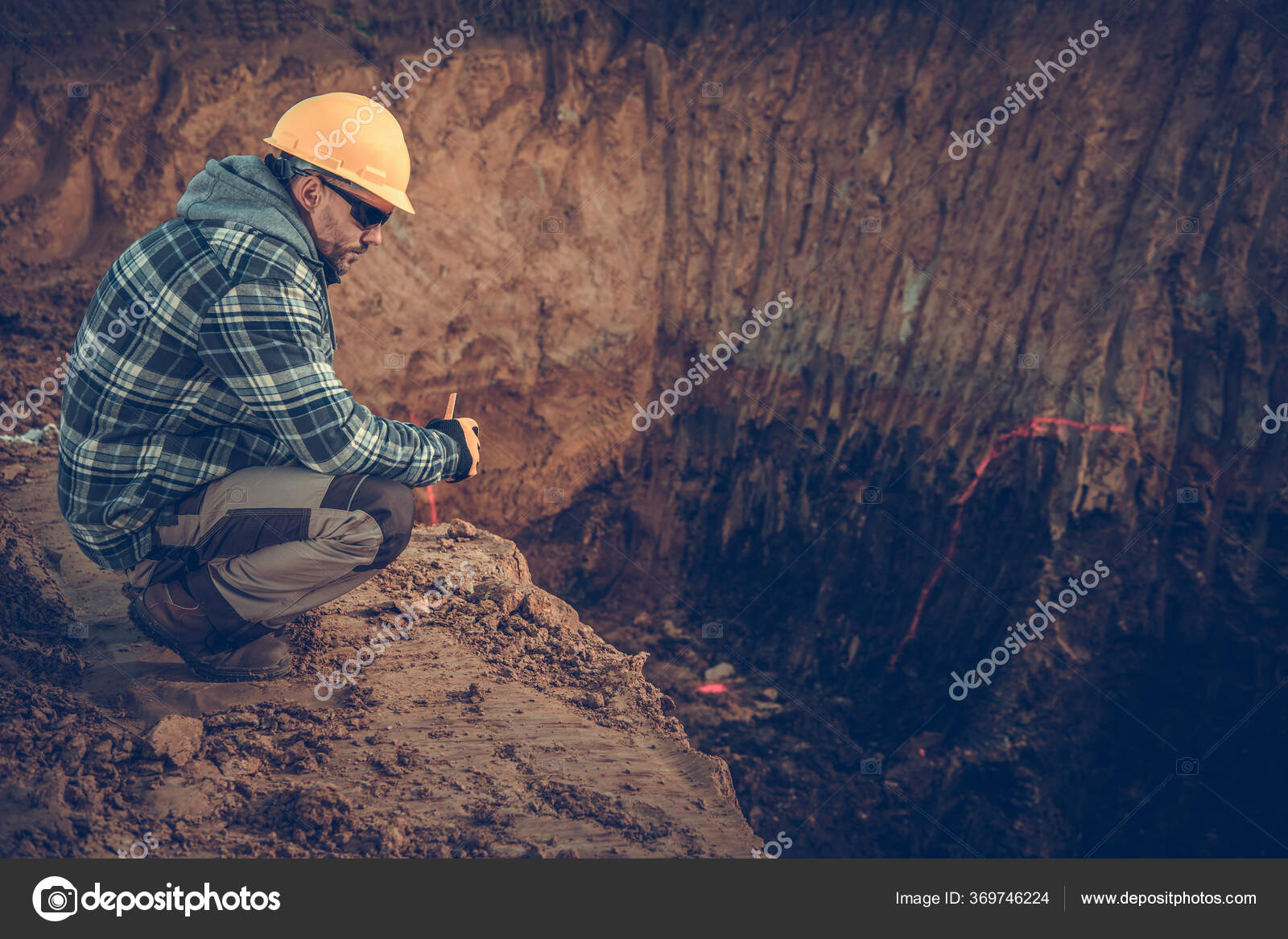 Male Engineering Geologist Analyzes Ground Materials New Construction ...