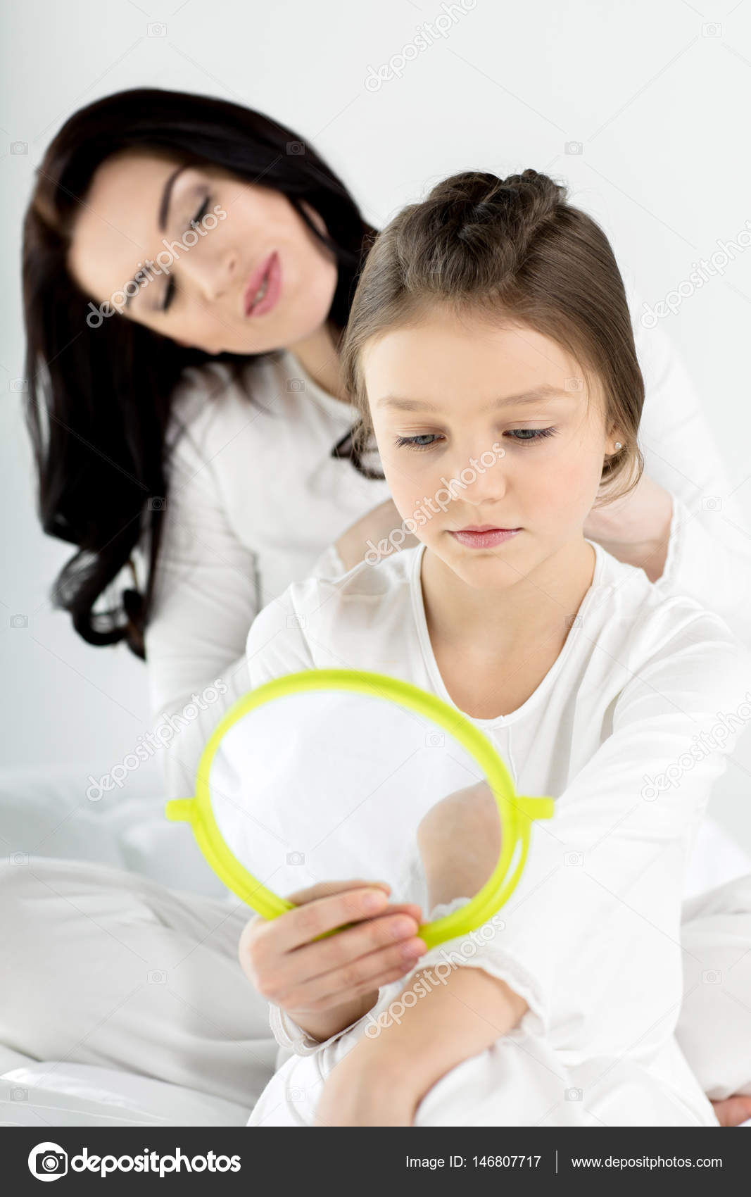 Mother combing hair of daughter — Stock Photo © YuraSokolov #146807717 Mother combing hair of daughter — Stock Photo © YuraSokolov #146807717