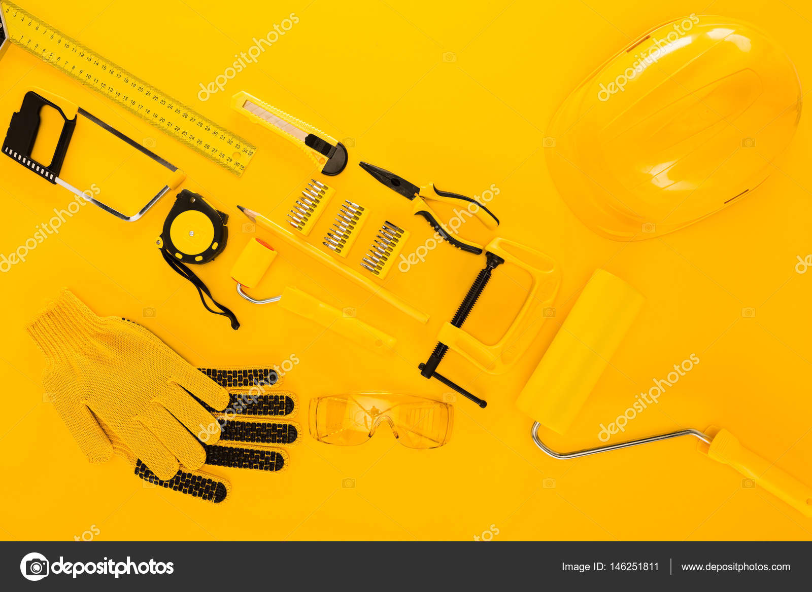 Top view of various work tools and equipment on yellow — Stock Photo ...