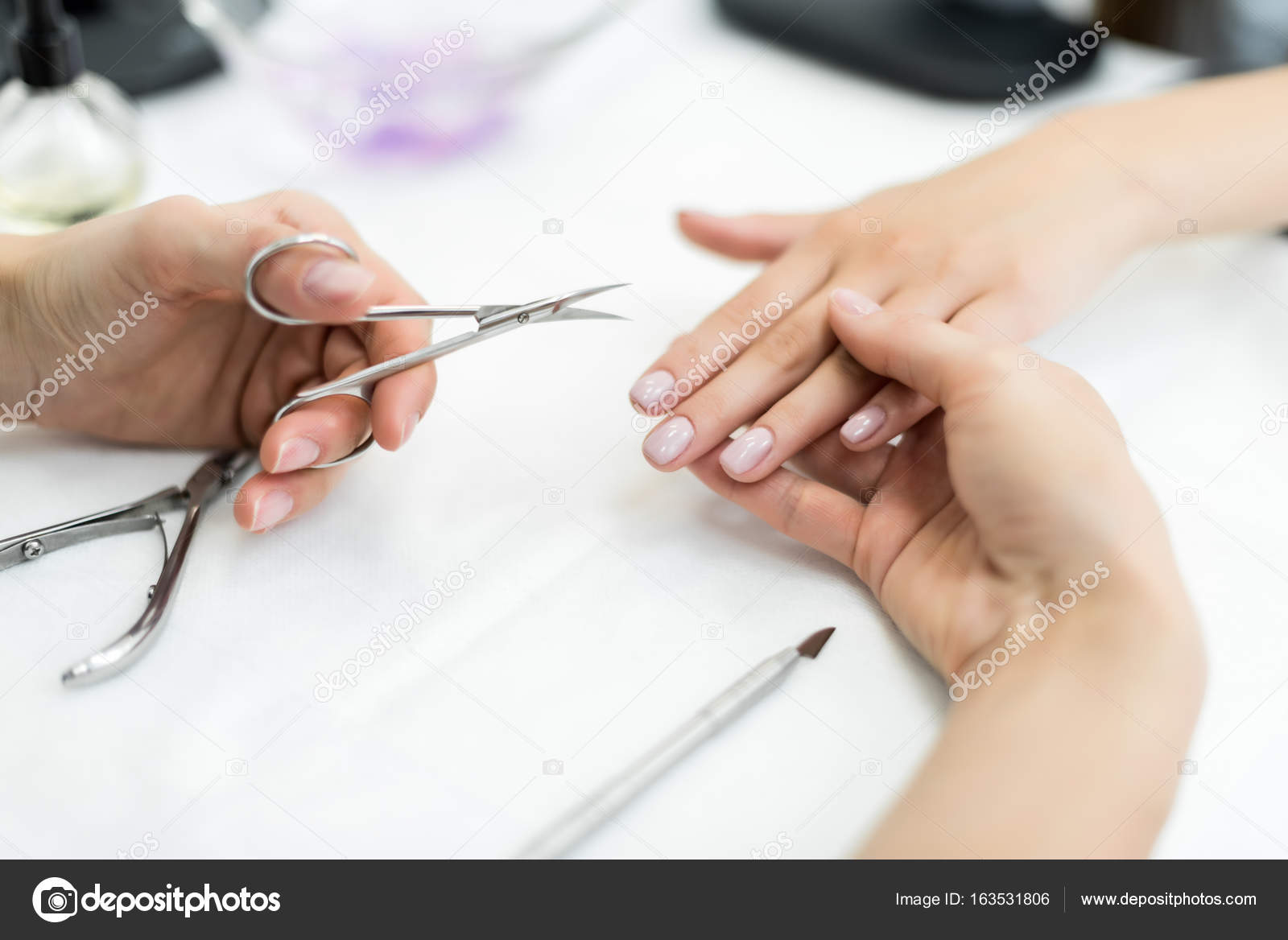 Professional manicure procedure — Stock Photo © DimaBaranow #163531806