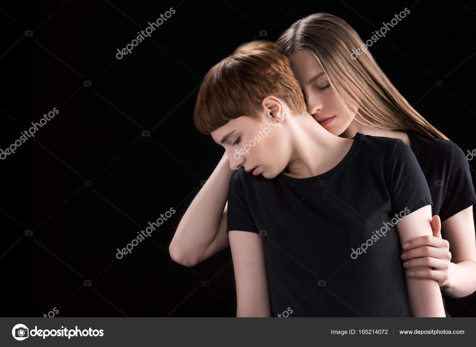 Young woman embracing girlfriend — Free Stock Photo © DimaBaranow ...