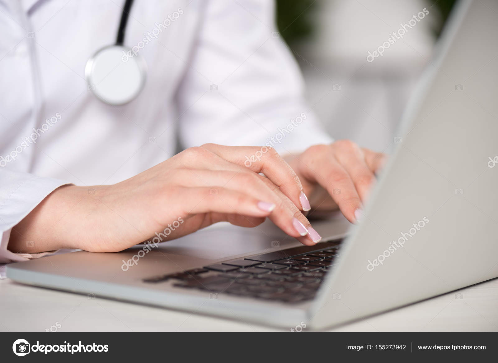 Doctor using laptop — Stock Photo © AlexLipa #155273942