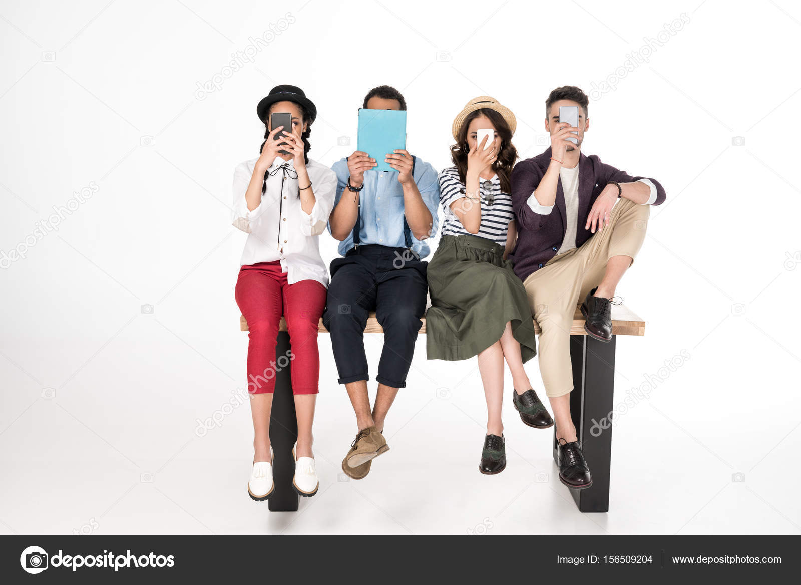 Friends using digital devices — Stock Photo © AlexLipa #156509204