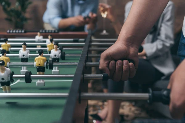 Friends playing foosball Stock Photos, Royalty Free Friends playing ...