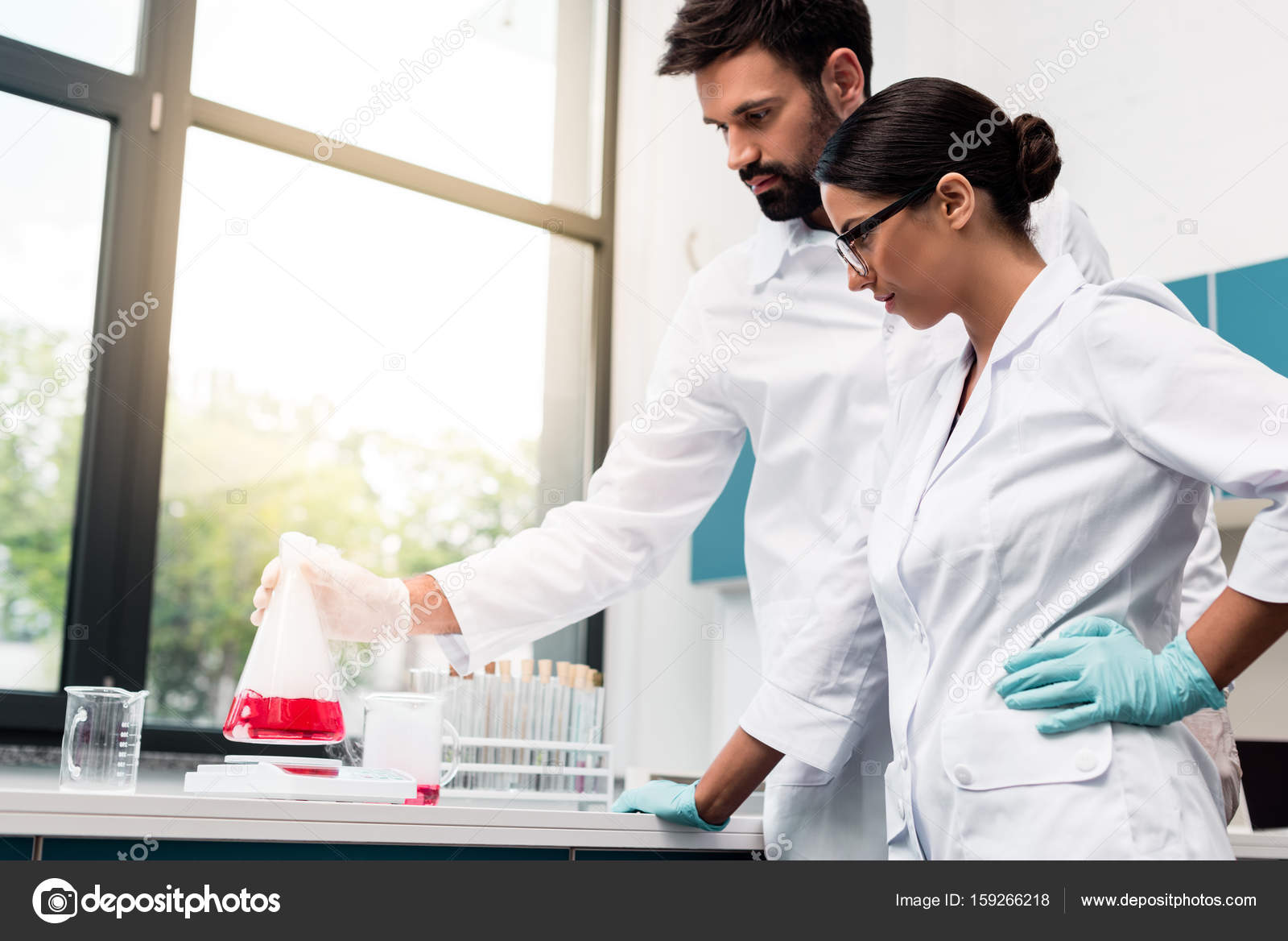 Scientists working in laboratory — Stock Photo © AlexLipa #159266218