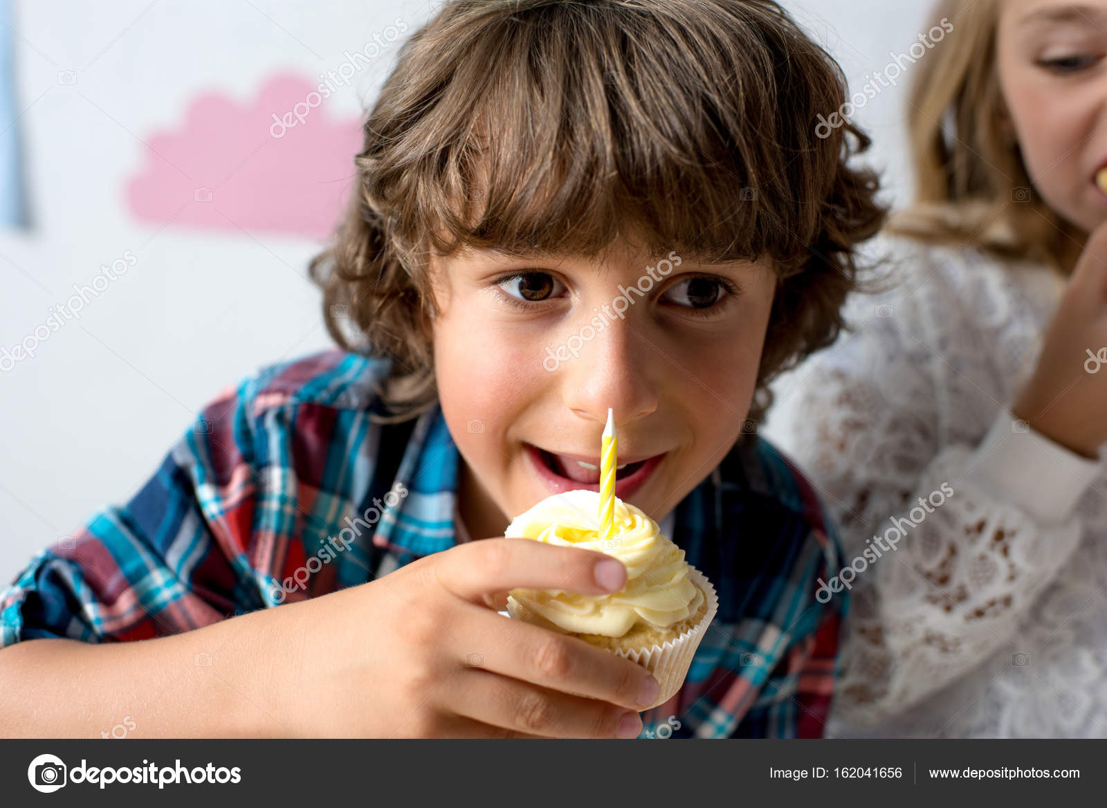 Kid Eating Cupcake