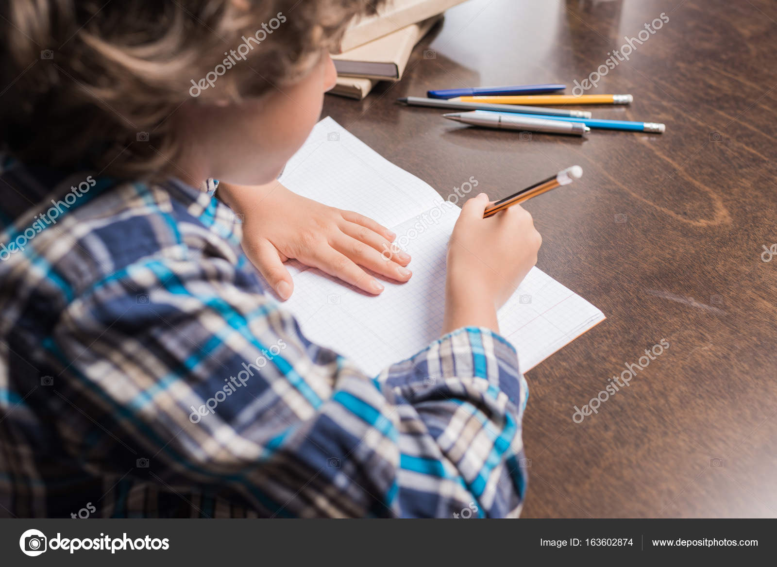 Child doing homework — Stock Photo © AlexLipa #163602874