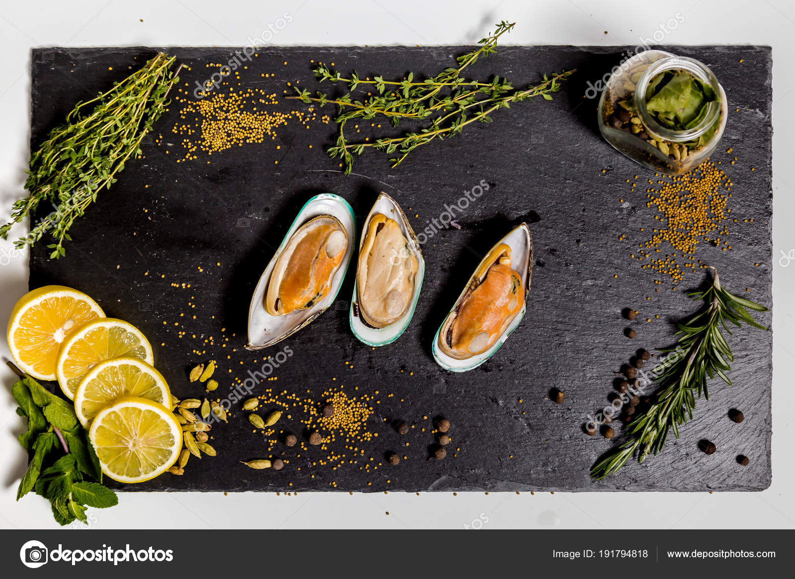 Mussels in the shell lie on a platter — Stock Photo © Most55 #191794818