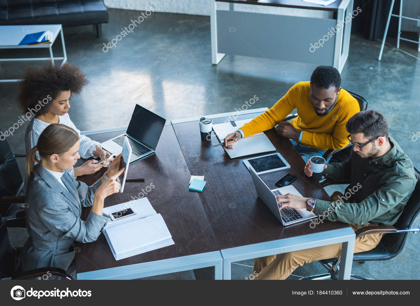 High Angle View Multicultural Businesspeople Using Gadgets Office Stock ... High Angle View Multicultural Businesspeople Using Gadgets Office Stock ...