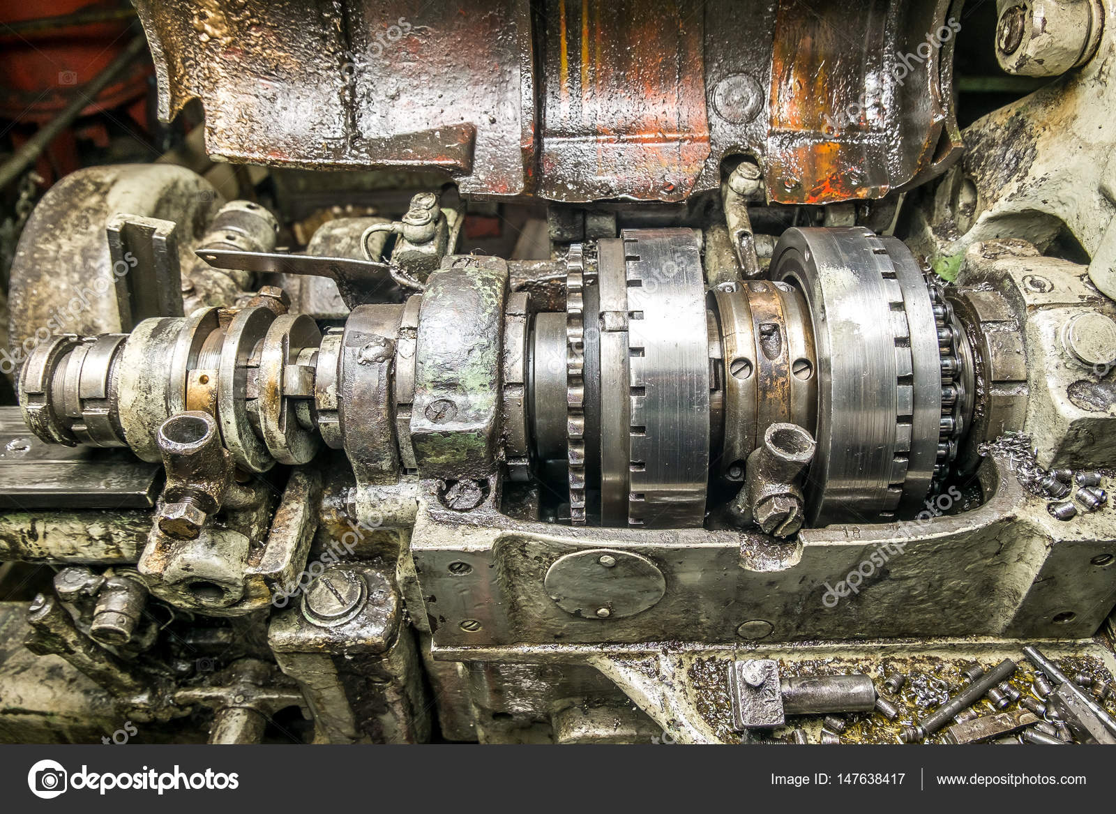 An old machine repairing process Stock Photo by ©dobrovizcki 147638417