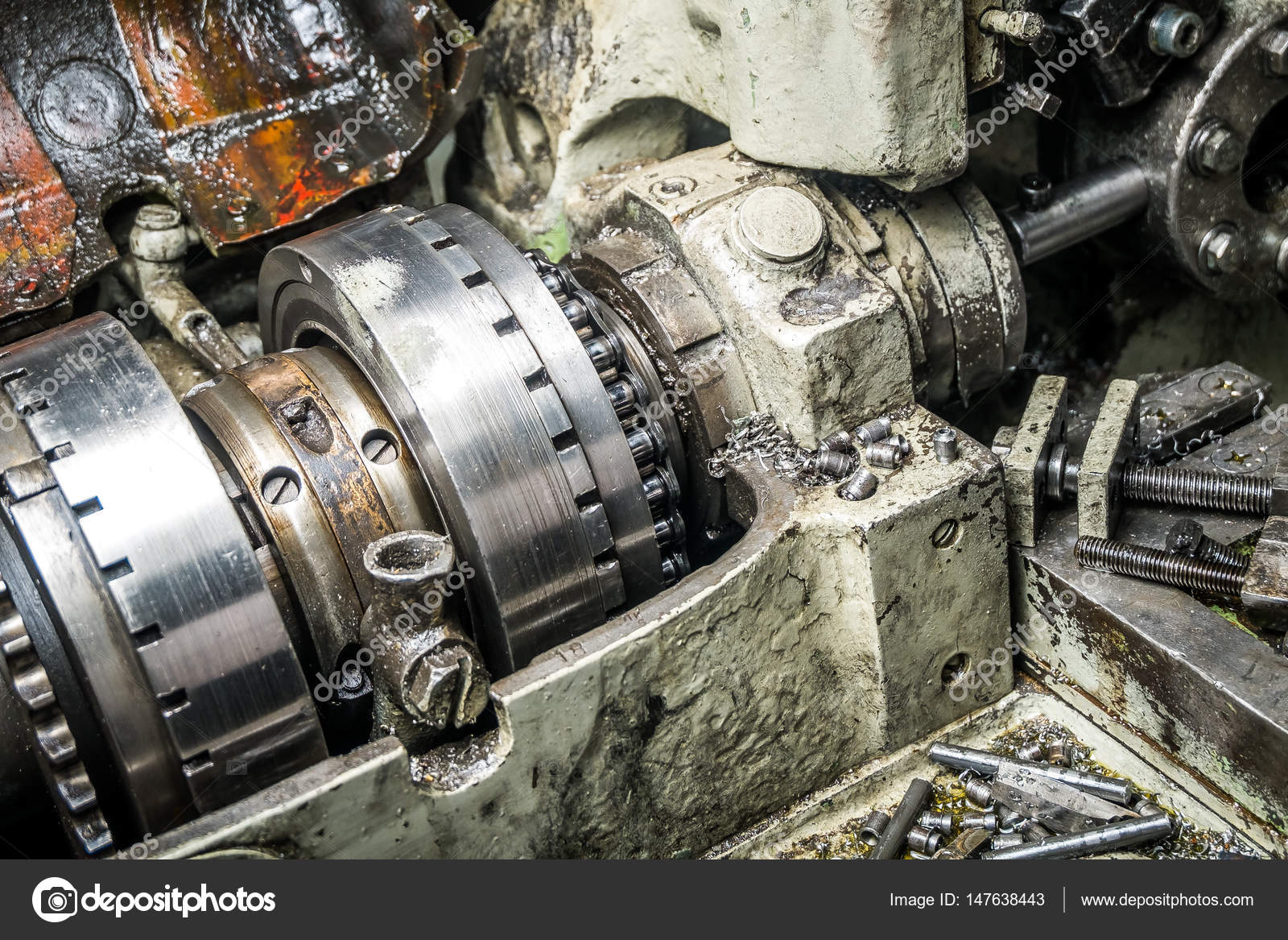 An old machine repairing process Stock Photo by ©dobrovizcki 147638443