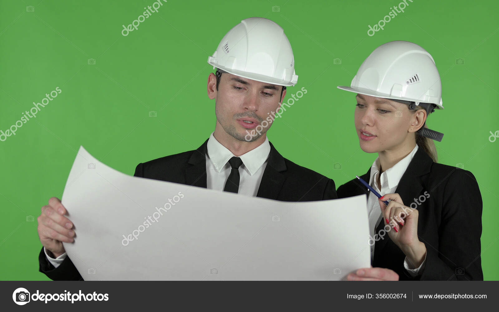 Happy Female Engineer Explaining Blueprint to Male Engineer, Chroma Key ...