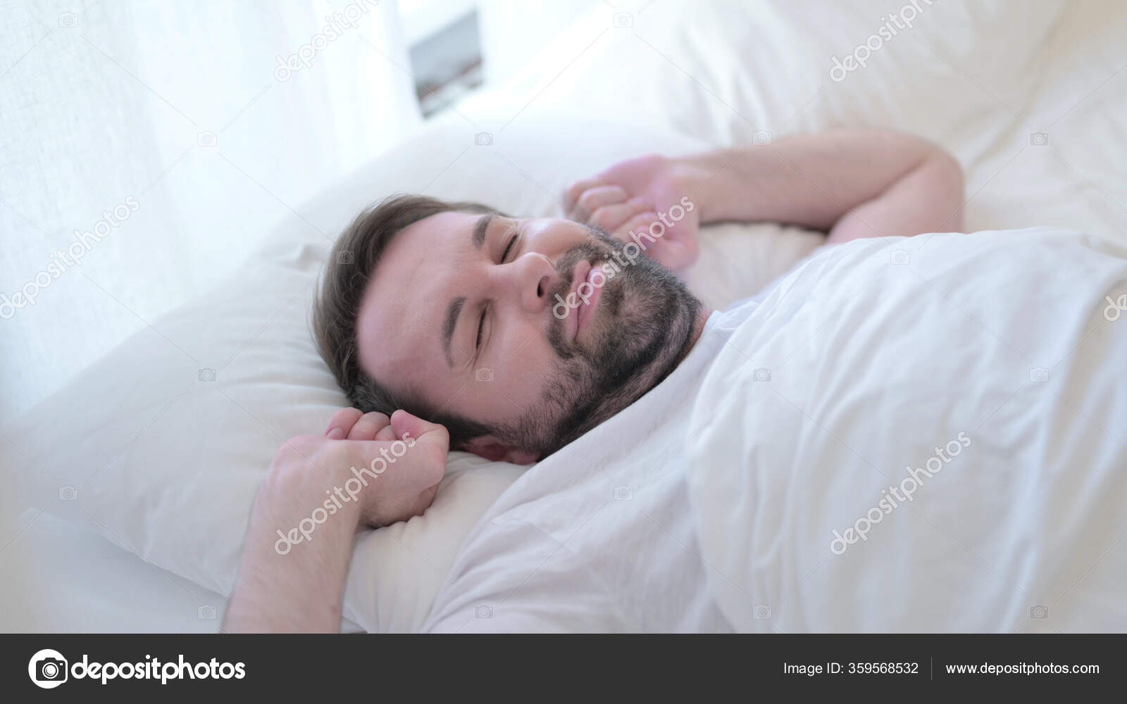 Attractive Beard Young Man Waking up and getting Out of Bed — Stock Photo © mustang.marshal ...