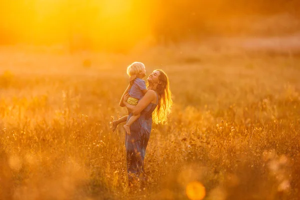 Mom hugging son Stock Photos, Royalty Free Mom hugging son Images ...