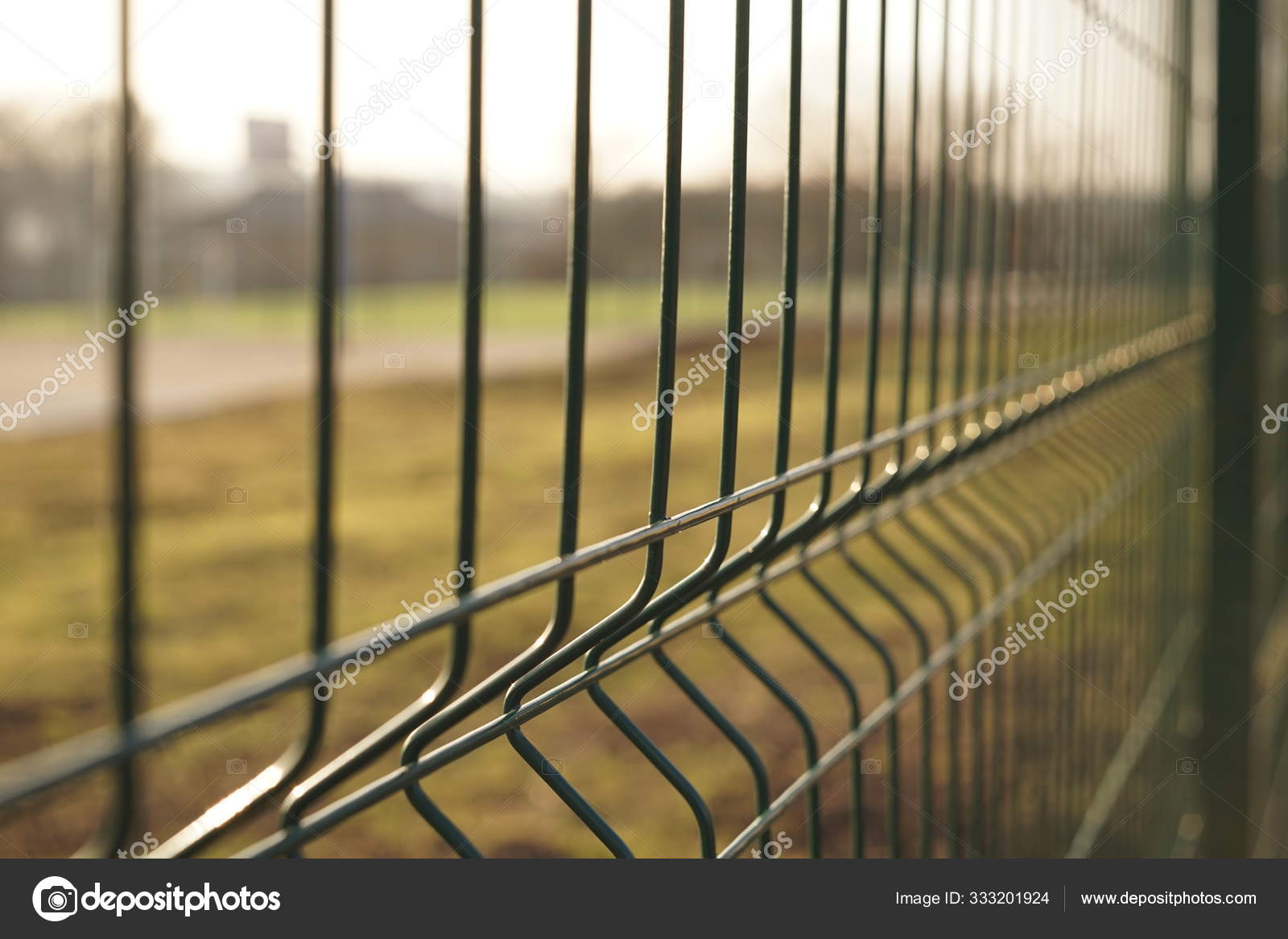 New green grid fence closeup, perspective view, selective focus. Stock ...