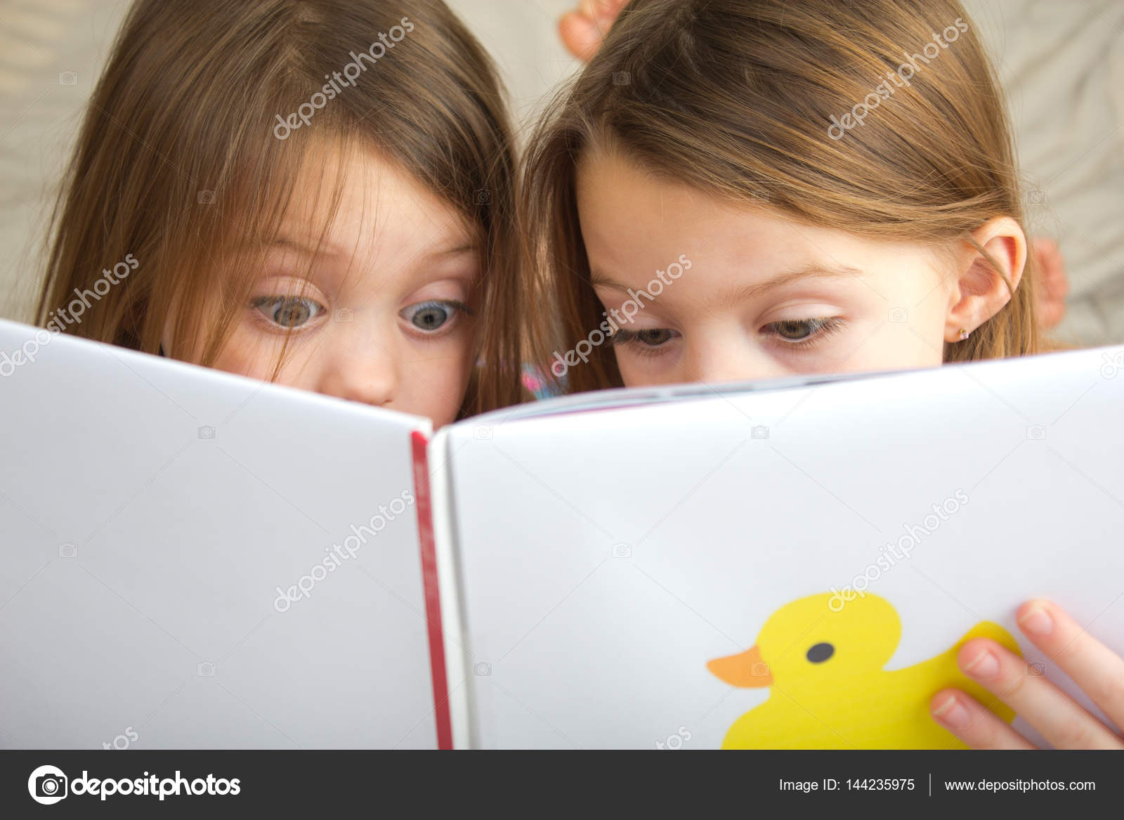 Children reading a story Stock Photo by ©markcarper 144235975