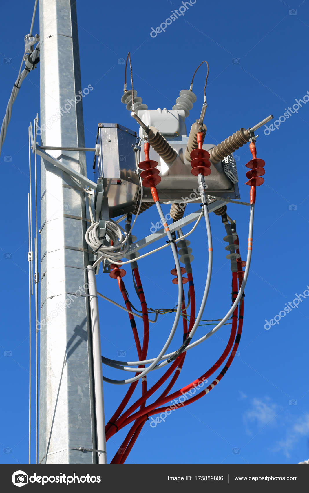 Electric transformer and big red high voltage wires Stock Photo by ...
