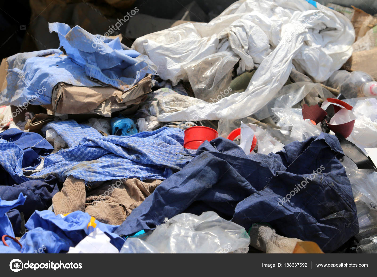 Rags and waste fabrics in the landfill Stock Photo by ©ChiccoDodiFC ...