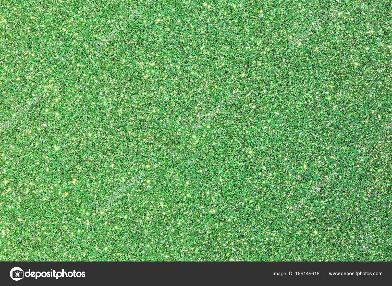 Shimmering GREEN background in glittery material ideal as a very ...