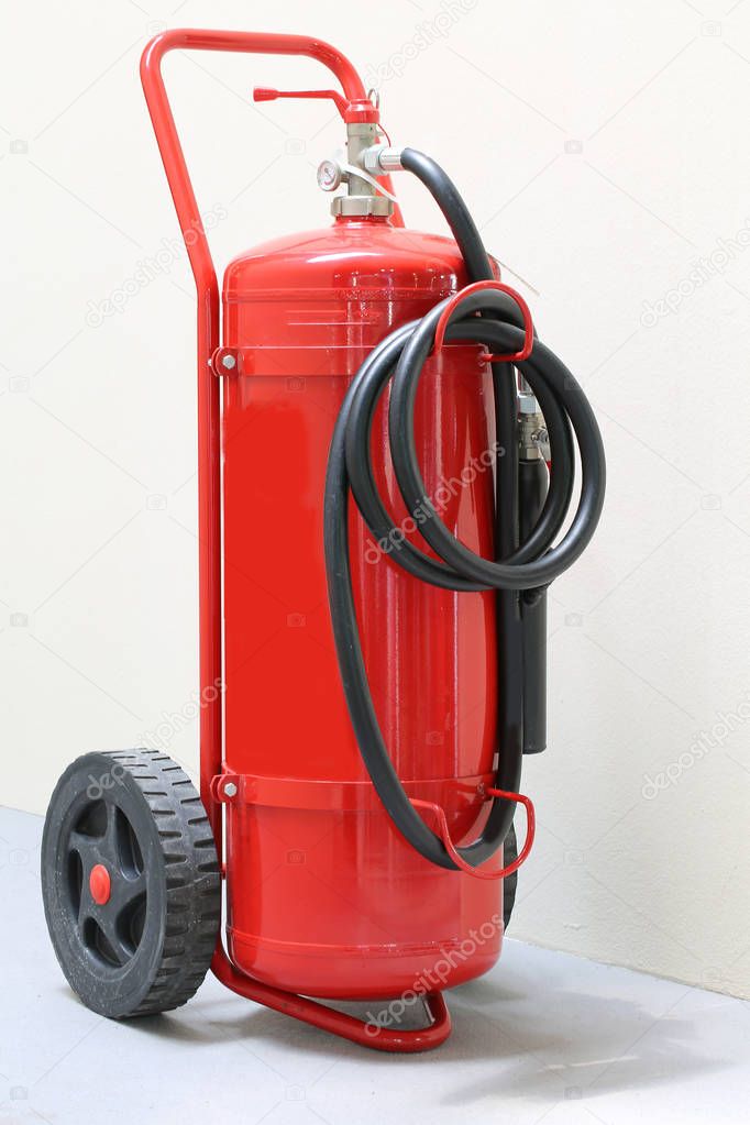 Big wheeled fire extinguisher — Stock Photo © ChiccoDodiFC #189490298