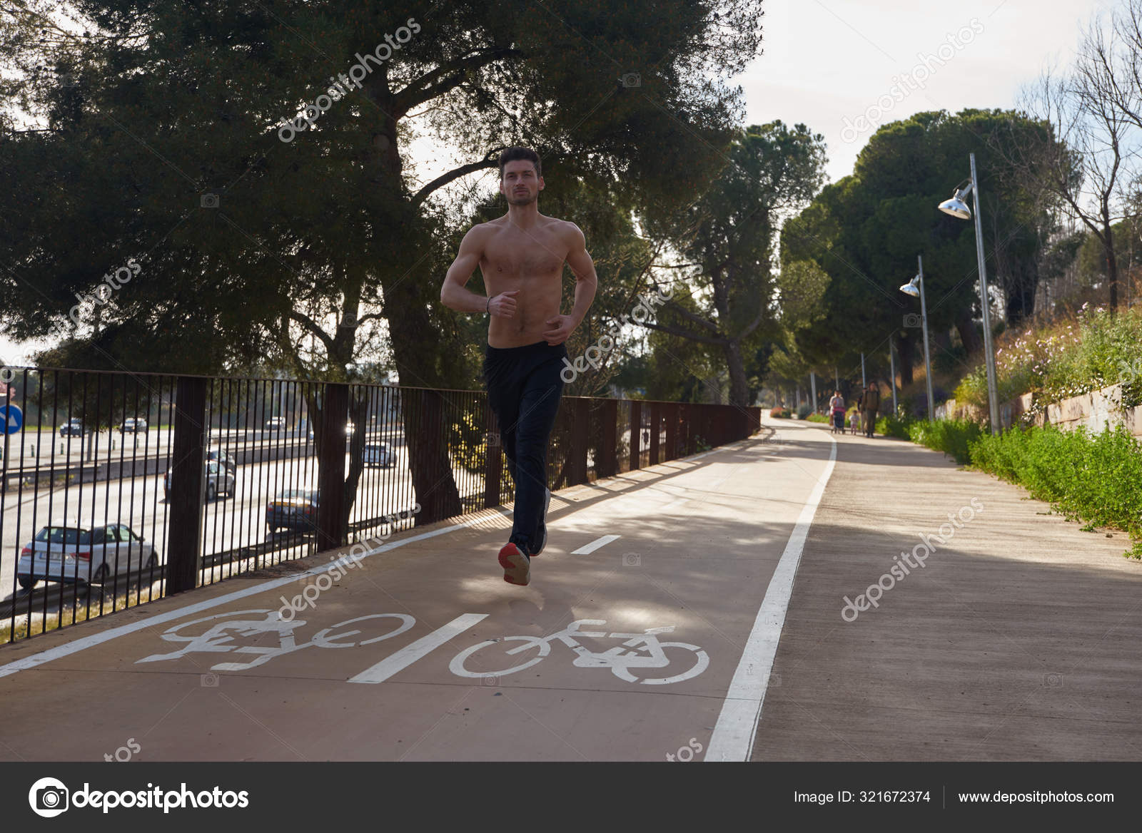 Dark haired young man running with no shirt Stock Photo by ©pablocalvog ...