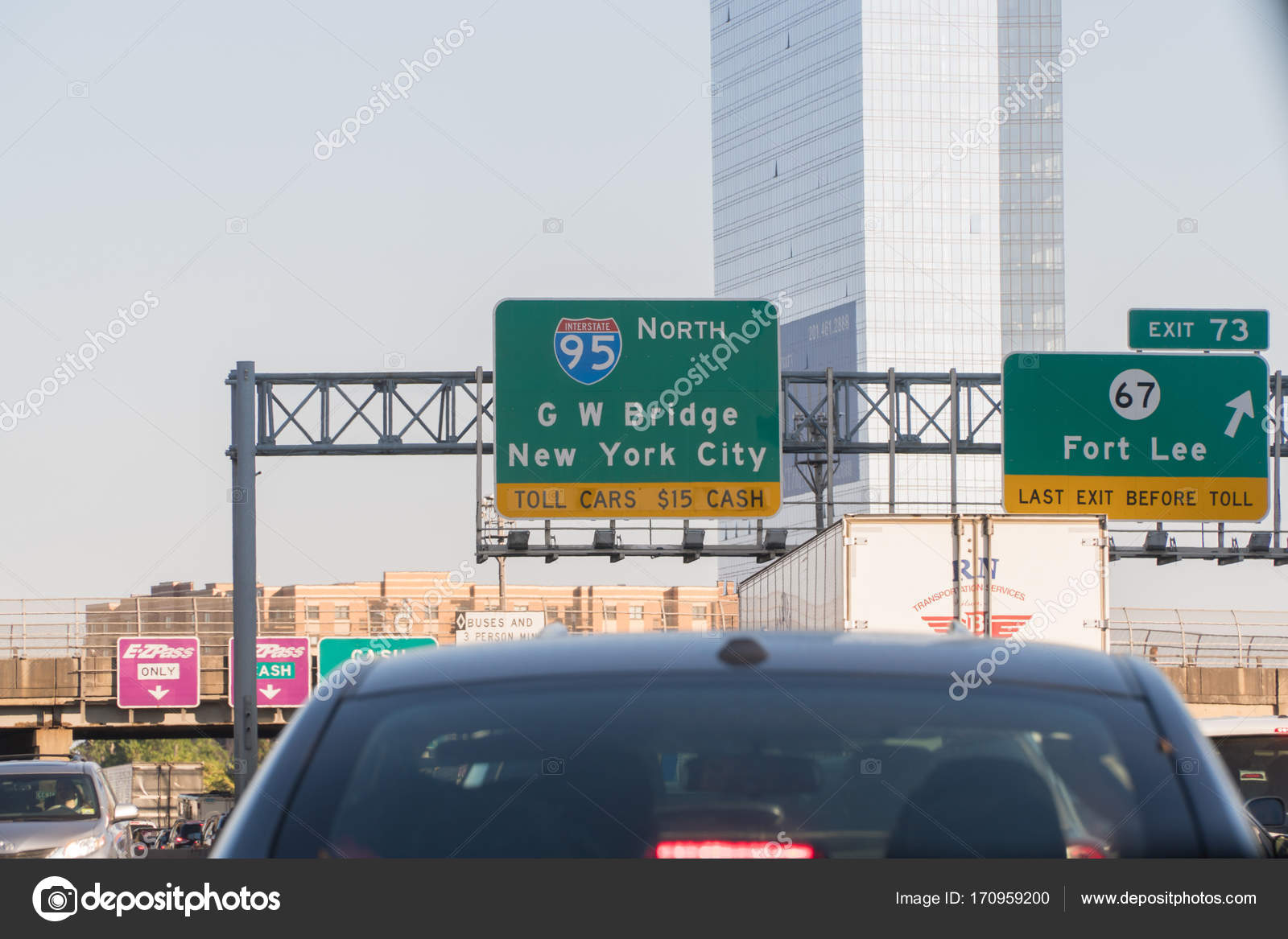 Highway signs overhead road direction to Manhattan over George ...