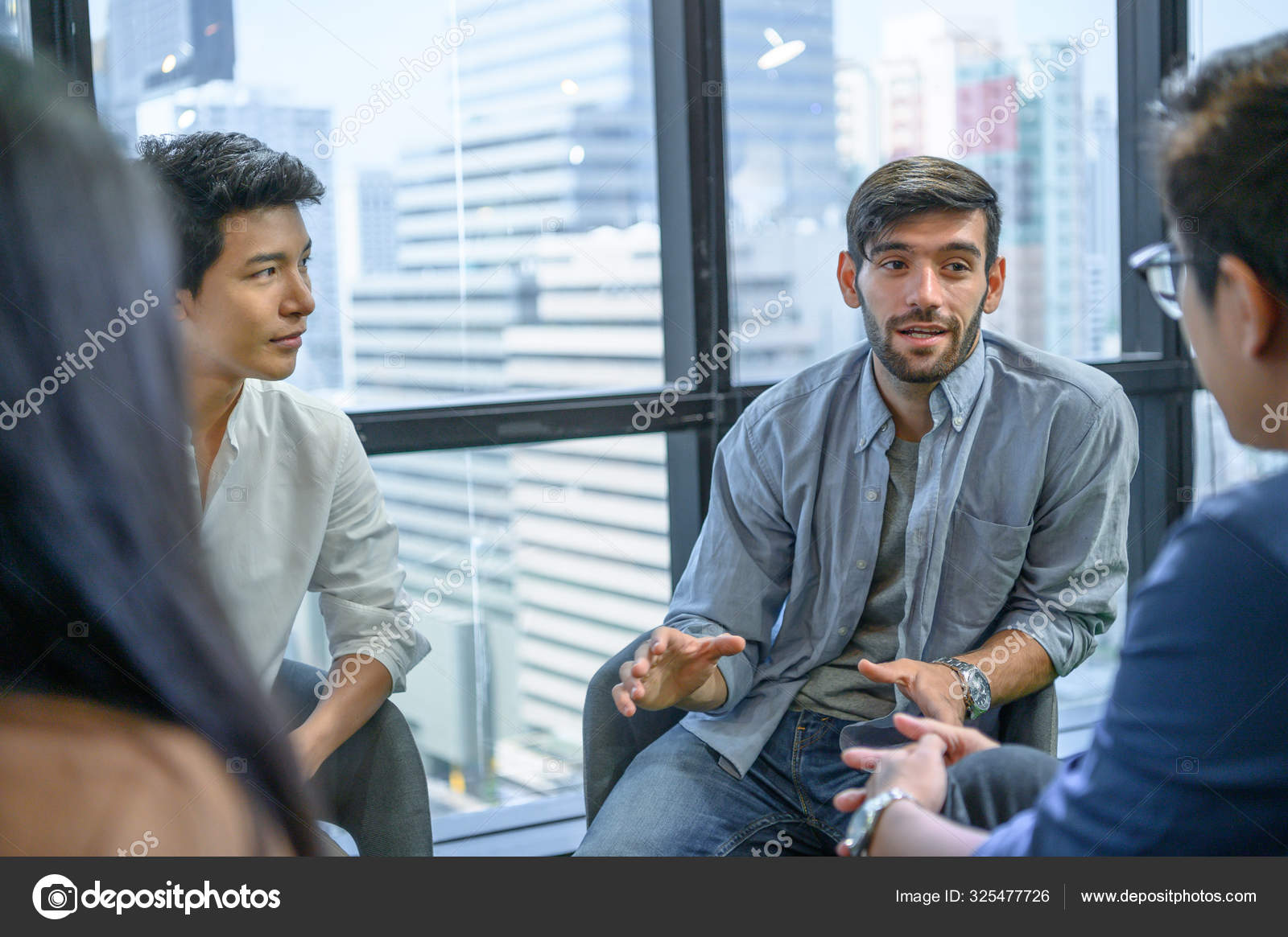 Psychotherapist inquiring about symptoms occurring within mind f ...