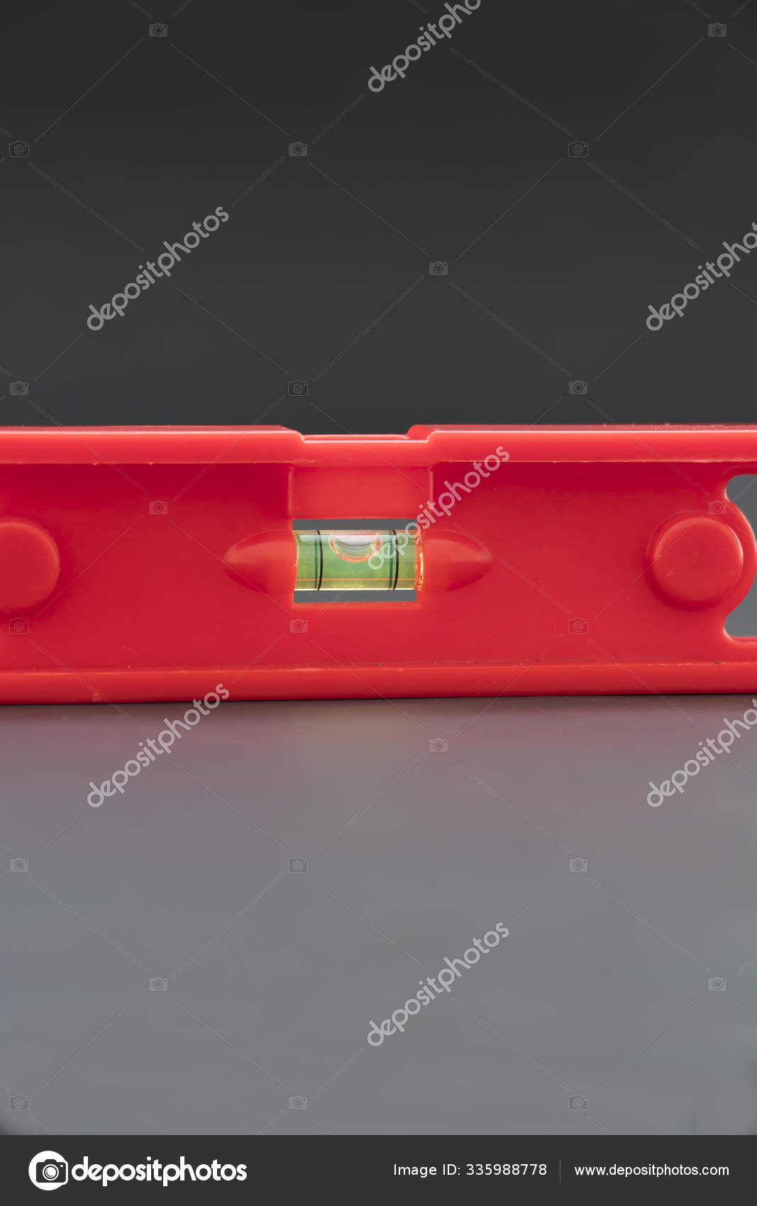 Red level tool used for determinig the level of a surface for ...