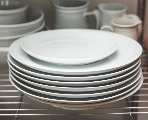 Stack of dishes Stock Photos, Royalty Free Stack of dishes Images ...