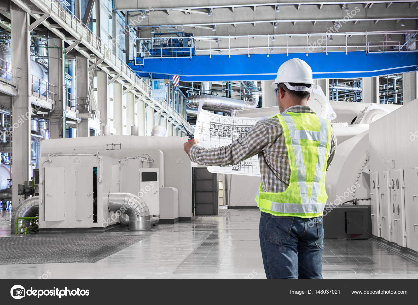Engineer reading drawing diagram for maintance at thermal power Stock ...