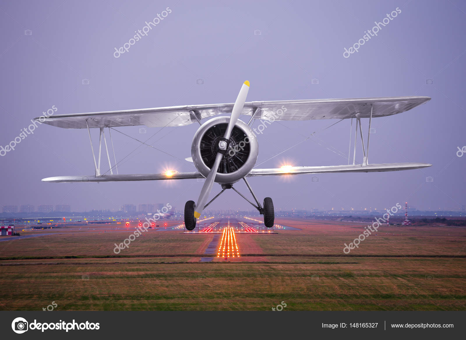 Retro plane fly up over takeoff runway from airport at twilight Stock ...