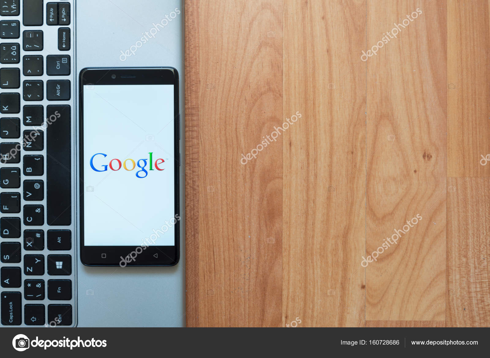 Google logo on smartphone — Stock Editorial Photo © Pe3check #160728686
