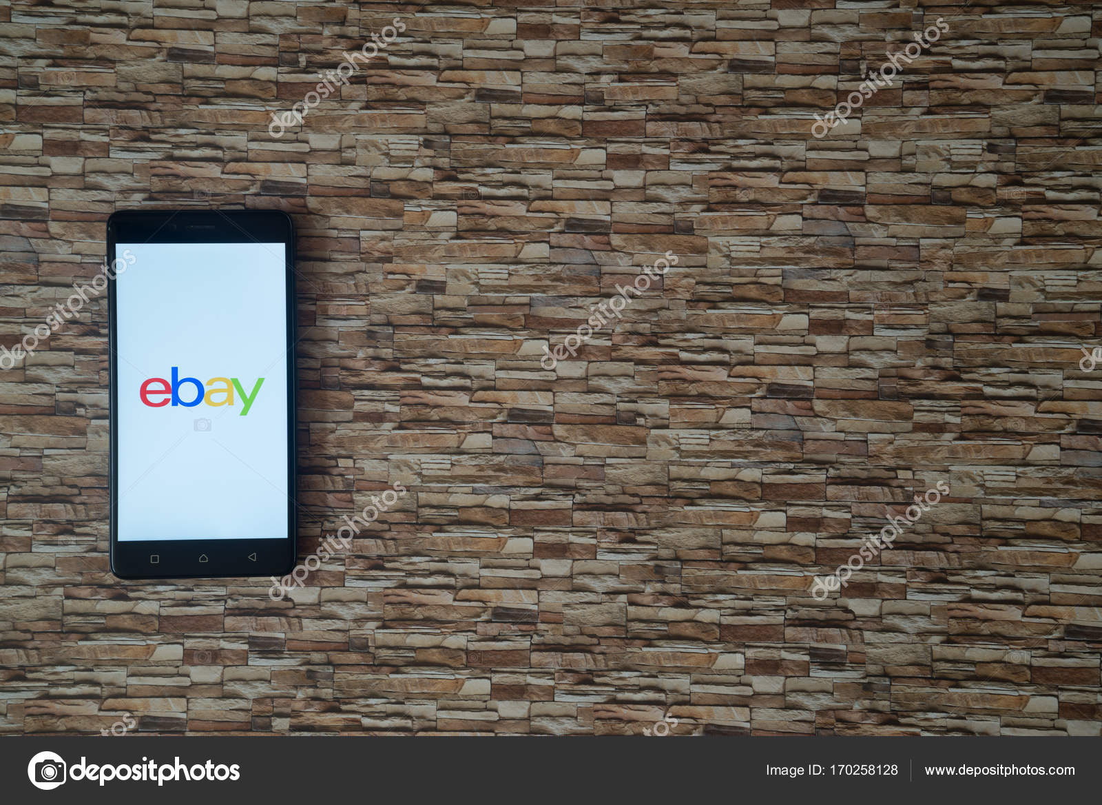 Ebay logo on smartphone screen on stone facing background — Stock ...