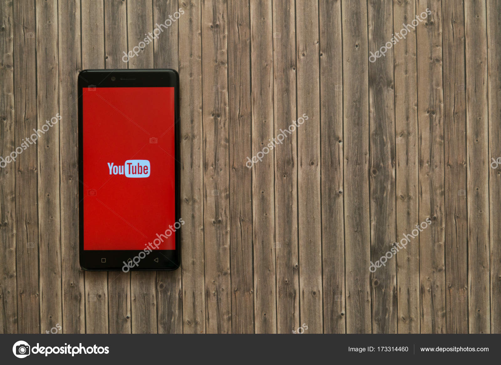 Youtube logo on smartphone screen on wooden background. – Stock ...