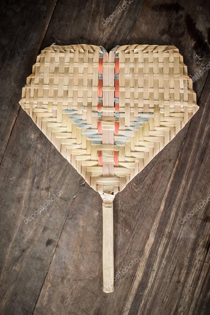 Thai traditional fan made from bamboo with wood background — Stock ...