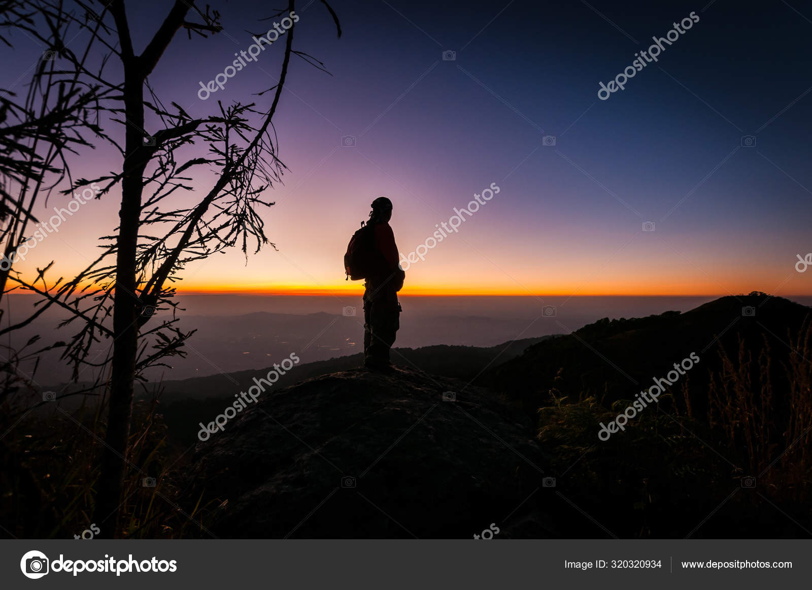 Silhouette light person looking sunset landscape Stock Photo by ...