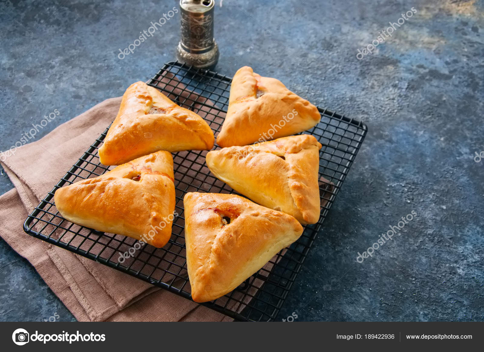 Homemade baked uchpuchmak (samsa) with meat and potato served on Stock ...