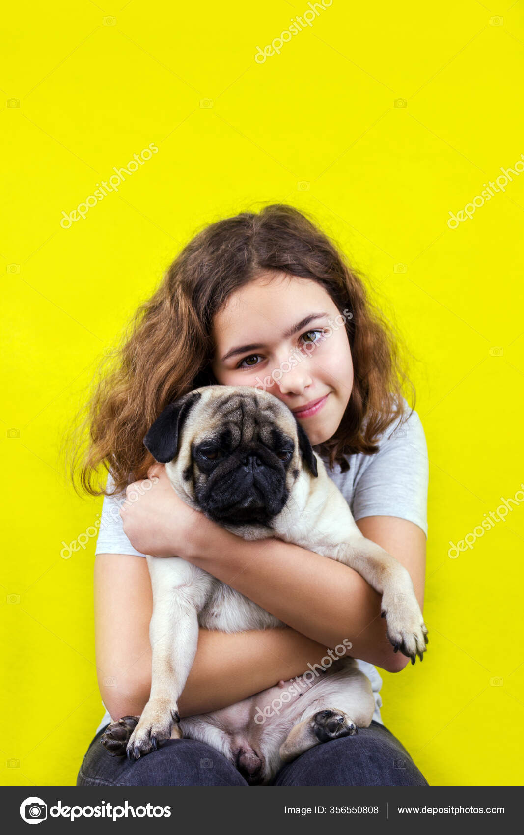 Pet Love Curly Teenager Girl Hugs Her Sad Pug Dog — Stock Photo © Yannamelissa #356550808