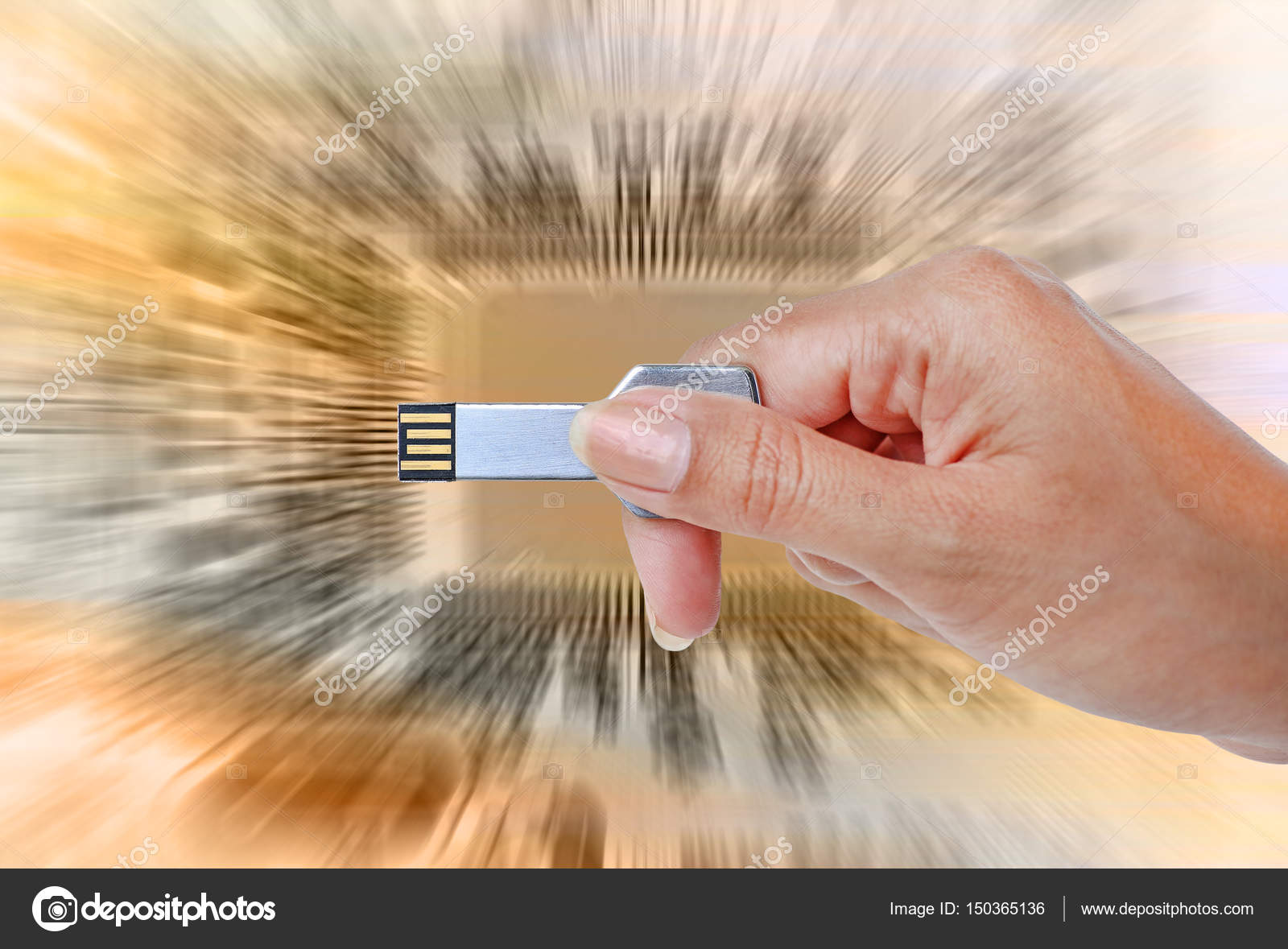 Hand holding USB data storage against light and circuit background ...