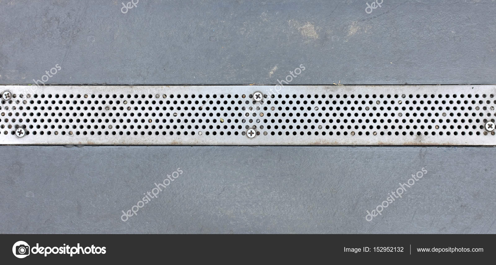 Top view of Iron grate of water drain on street. Stock Photo by ©civic ...