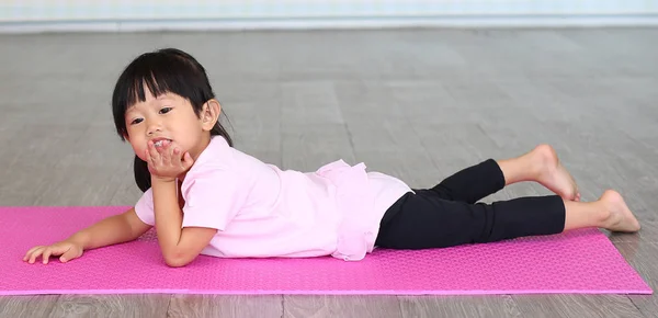 Kid girl doing exercise Stock Photo by ©civic_dm@hotmail.com 156274560