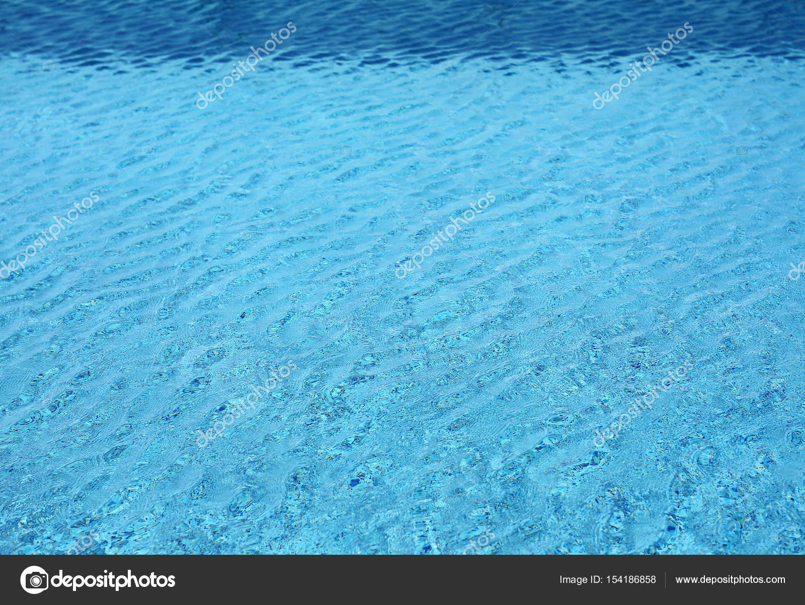 Water wave in swimming pool with light reflecting. Texture background ...