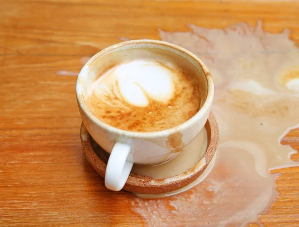 Coffee spilled on the wood table - Stock Image - Everypixel