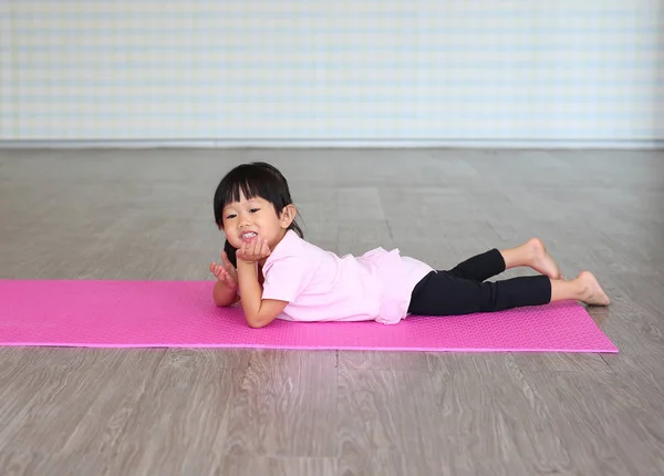 Kid girl doing exercise Stock Photo by ©civic_dm@hotmail.com 156274560