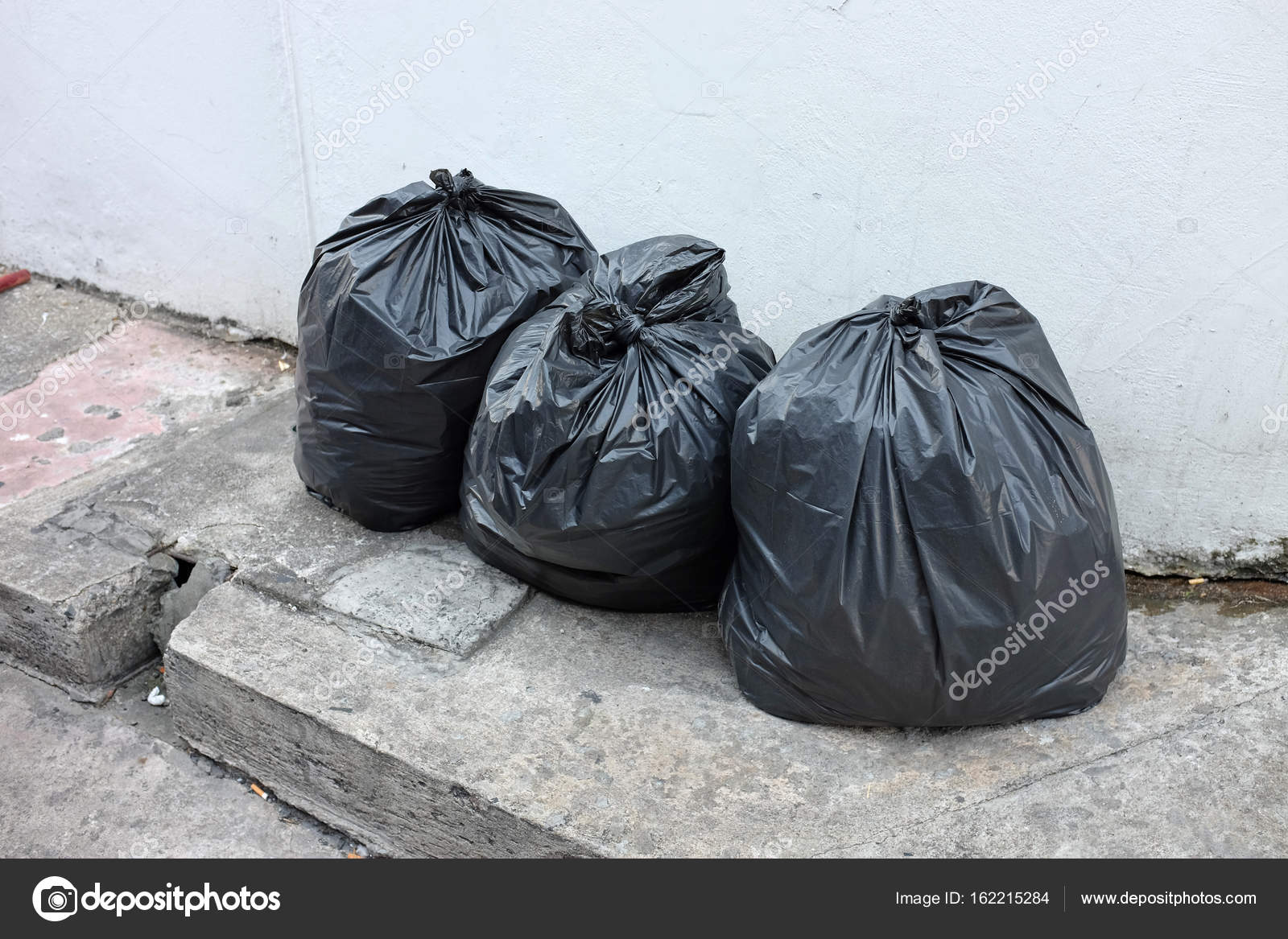 Plastic trash bags on outside street office — Stock Photo © civic_dm ...